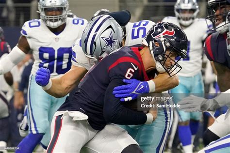 Jeff Driskel Of The Houston Texans Is Hit By Leighton Vander Esch Of