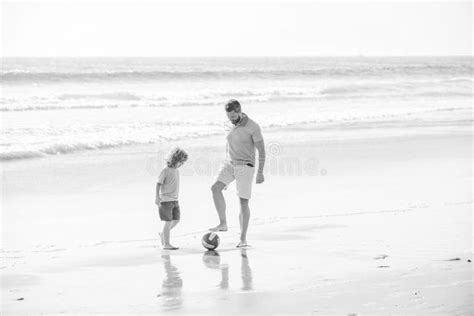 Sport Activity Father And Son Play Football On Beach Stock Photo Image Of Soccer Activity