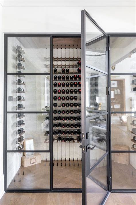 Modern Wine Cellar With Iron Doors Vinkällare Matsalsbord Hallinredning