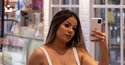 A Woman Taking A Selfie In A White Bra Photo Free Photography Image