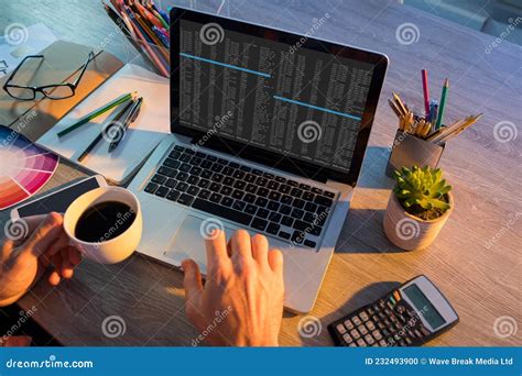 Hands Of Caucasian Male Programmer Sitting At Desk And Using Laptop