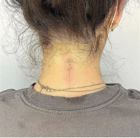 Pin By Mikayla Greenwood On Tats Flower Neck Tattoo Behind The Neck