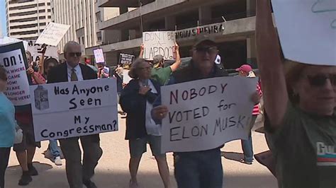 Community Gathers To Protest Trump Policies Downtown