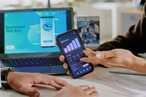 Analyzing Data On Smartphone At Office Desk Stock Image Image Of