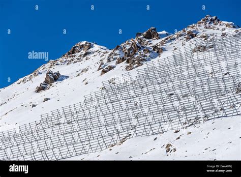 Avalanche Protection Barriers On A Snowy Slope Stock Photo Alamy
