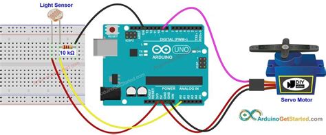 Arduino Light Sensor Triggers Servo Motor Arduino Tutorial Arduino Arduino Ir