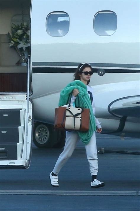 Selena Gomez Arrives At A Private Jet In Los Angeles