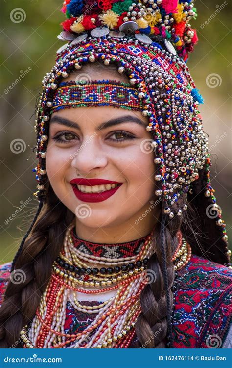 Portrait Of A Romanian Woman Wearing Traditional National Costume