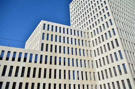 Premium Photo Modern Office Building Detail Perspective View Of Geometric Angular Concrete Windows