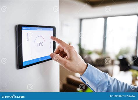 A Man Pointing To A Tablet With Smart Home Screen Stock Image Image