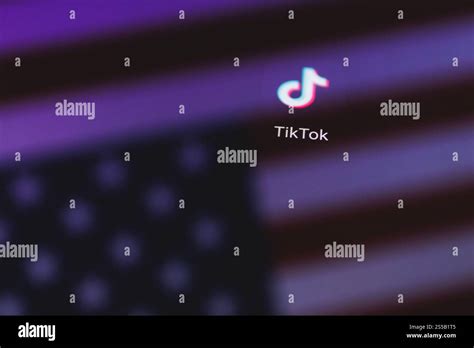 A Smartphone Displaying The Tiktok App Icon With The American Flag