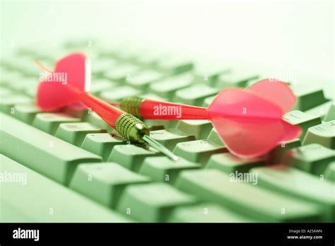 Darts On Keyboard Stock Photo Alamy