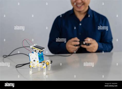 Teacher Collects A Handmade Metal And Plastic Robot Stem Education For