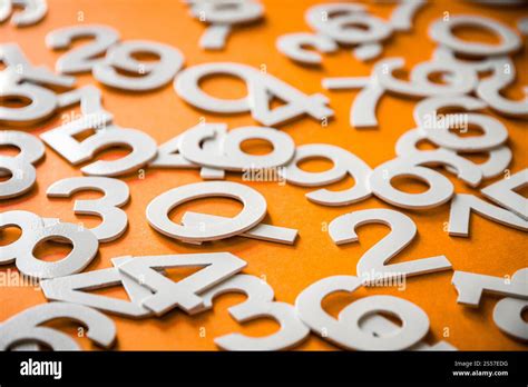 Mathematics Background Made With Solid Numbers On A Board Isolated On Orange Mathematics