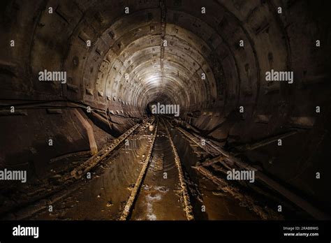 Dark Dirty Abandoned Subway Tunnel With Rusty Railway Stock Photo Alamy