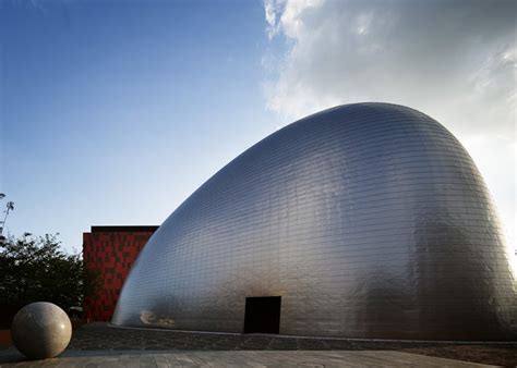 Blob Shaped Silver Building At A Japanese Music College
