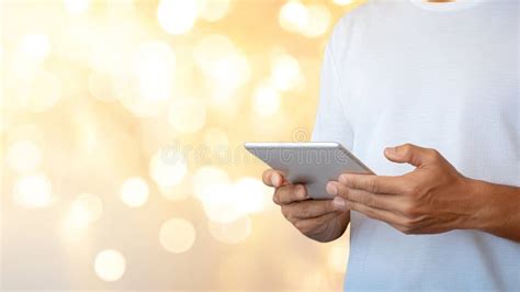 Man Holding Tablet Immersed In Digital Exploration And Content