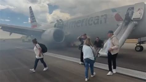 American Airlines Evacuated On Runway After Landing Gear Fire During