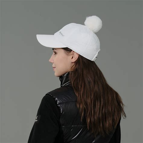 클리브랜드 골프웨어 105 추가할인 Fur방울 마름모퀼팅 귀덮개 여성 골프모자cgkwcp1901wh