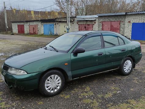 Купить б/у Mitsubishi Carisma I 1.6 AT (90 л.с.) бензин автомат в ...