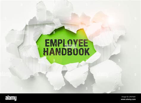 Hand Writing Sign Employee Handbook Word Written On Document That
