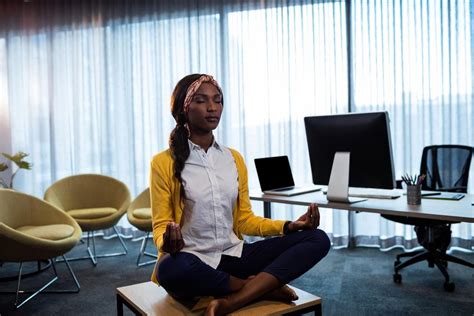 10 Office Yoga Poses To Try At Your Desk