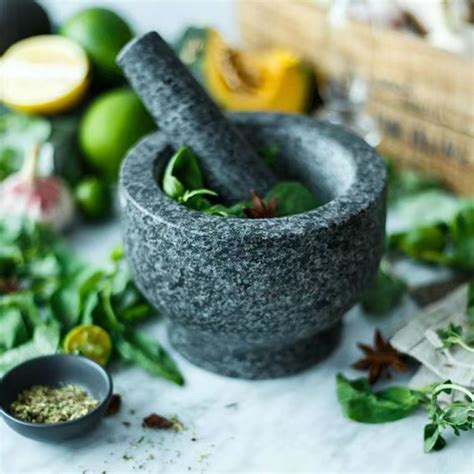 Mortar And Pestle With Herbs