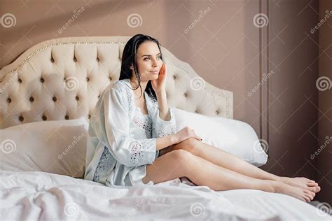 Perfect Tan Woman With Perfect Skin Big Full Lips Posing At Bedroom