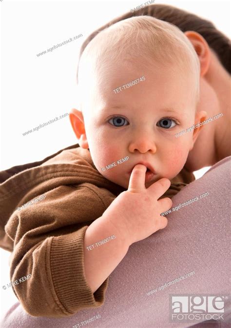 Mother And Son Embrace Stock Photo Picture And Royalty Free Image