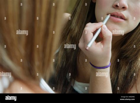 Applying Lip Liner Stock Photo Alamy