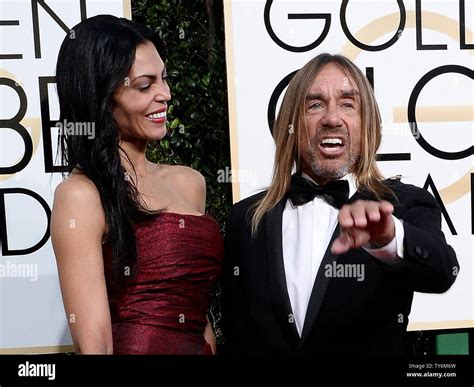 Iggy Pop R And Nina Alu Attend The 74th Annual Golden Globe Awards At