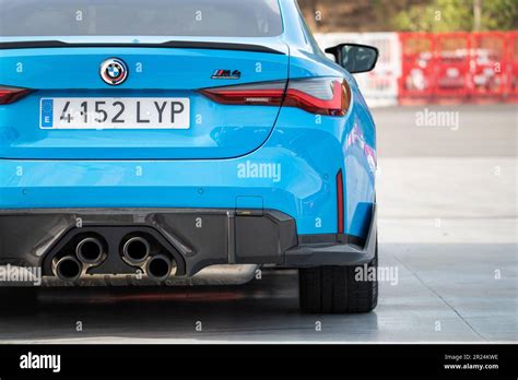 Back Of Detail Of A Modern Second Generation Bmw M4 Code G82 G83 From 2001 In Blue Color Stock Back Of Detail Of A Modern Second Generation Bmw M4 Code G82 G83 From 2001 In Blue Color Stock