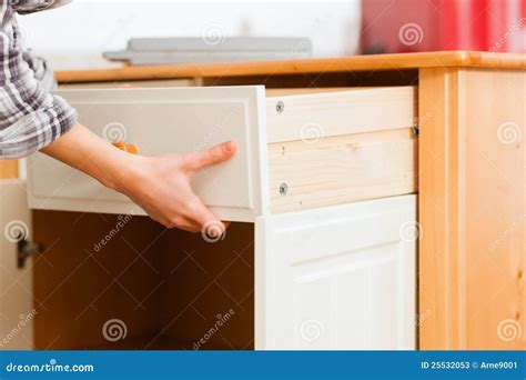 Young Woman Is Assembling A Cupboard Stock Image Image Of Beautiful