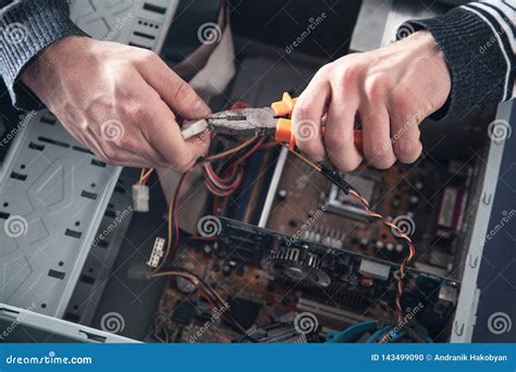 Man Repairs Computer Stock Photo Image Of Hardware 143499090