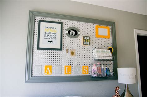 I Created A Framed Pegboard To House Diapering Supplies And Decor For