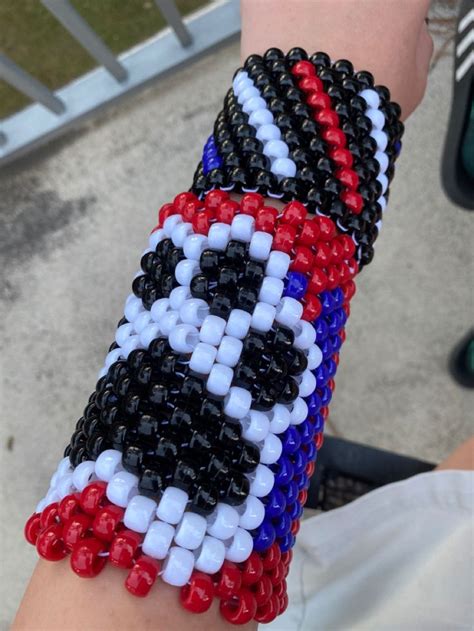 Red White Black And Blue Paw Kandi Kandi Red And White Embroidered Friendship Bracelet
