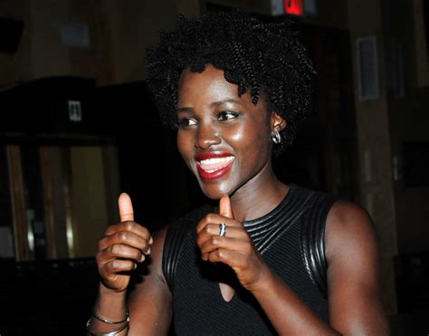 Celebrities Caught With Their Thumbs Up