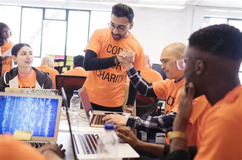 Hackers Celebrating And Coding At Hackathon Stock Image F0223000
