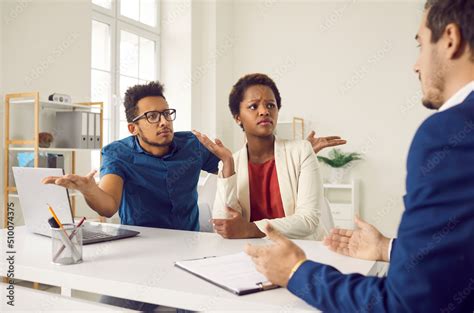 Clients And Bank Worker Have Misunderstanding Unhappy Angry Confused