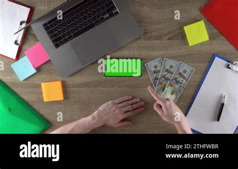 The Coder Is Showing The Programming Courses On The Phone Green Screen Mockup Concept