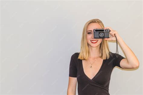 Free Photo Blonde Girl With Vintage Camera
