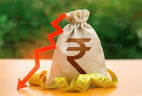 Indian Rupee Money Bag With Down Arrow And Measure Tape Reduced Wages Cuts In Social Benefits