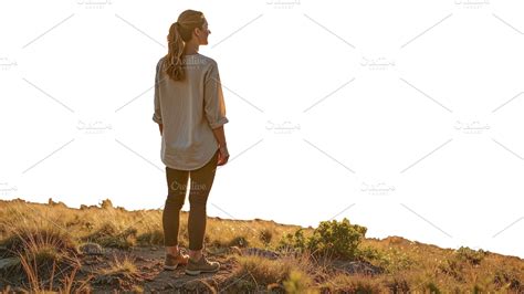 Woman Standing Alone At Sunrise On A Hilltop Isolated Photo A Person