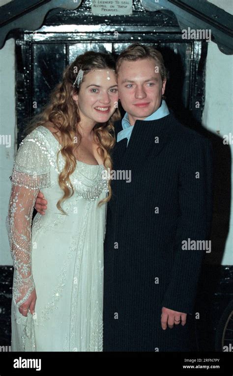 British Actress Kate Winslet And Jim Threapleton Pose For Photographs