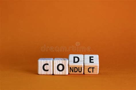 Code Of Conduct Symbol Wooden Blocks With Words `code Of Conduct` Businessman Hand