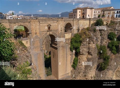 The Iconic Puente Nuevo Bridge In Ronda Spain Gracefully Arches Over