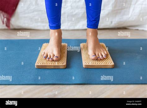 Woman Standing On Sadhu Boards With Sharp Nails Feet Close Up Stock