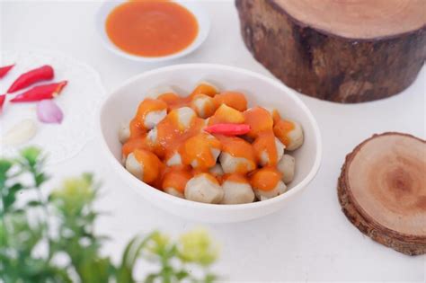 Premium Photo Small Meatballs With A Delicious Sauce As A Background