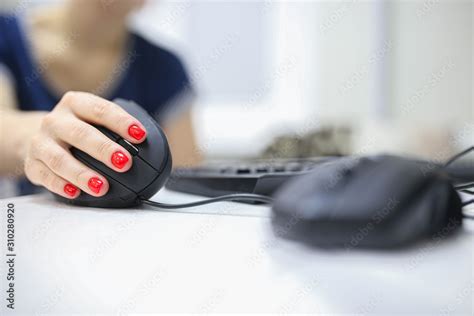 Girl S Hand Uses A Vertical Ergonomic Computer Mouse Joystick Stock Photo Adobe Stock