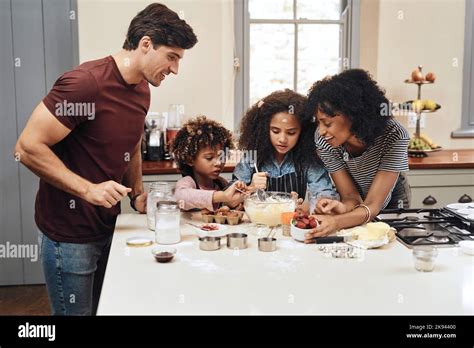 We Cant Wait To See The End Result A Young Couple Baking At Home With